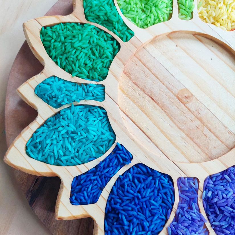 Sensory rainbow rice on flower tray – Ema Lou kids art craft